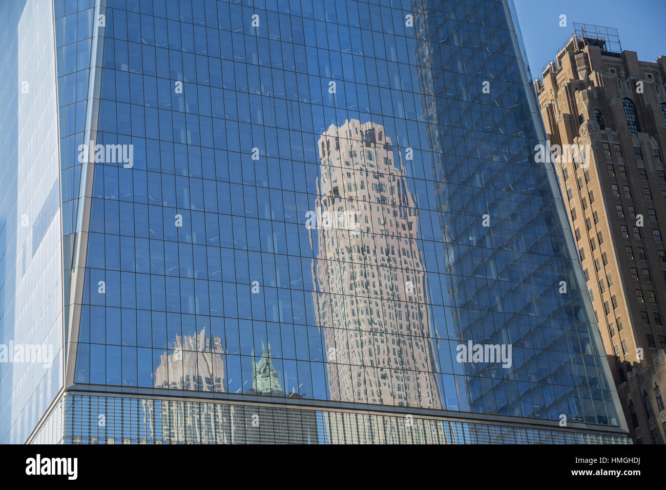 New York Skyscraper captured in glass buildings reflection in Manhattan ...