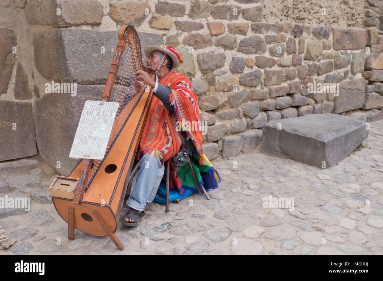 Native Quechua blind musician playing at the entrance of the Inca ...