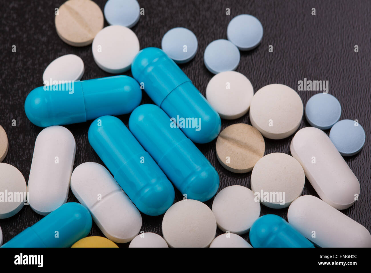 different Tablets pills capsule heap mix therapy drugs Stock Photo - Alamy