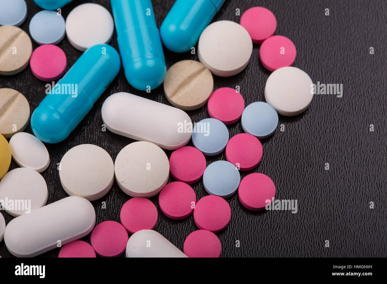 different tablets pills capsule heap mix therapy drugs Stock Photo - Alamy