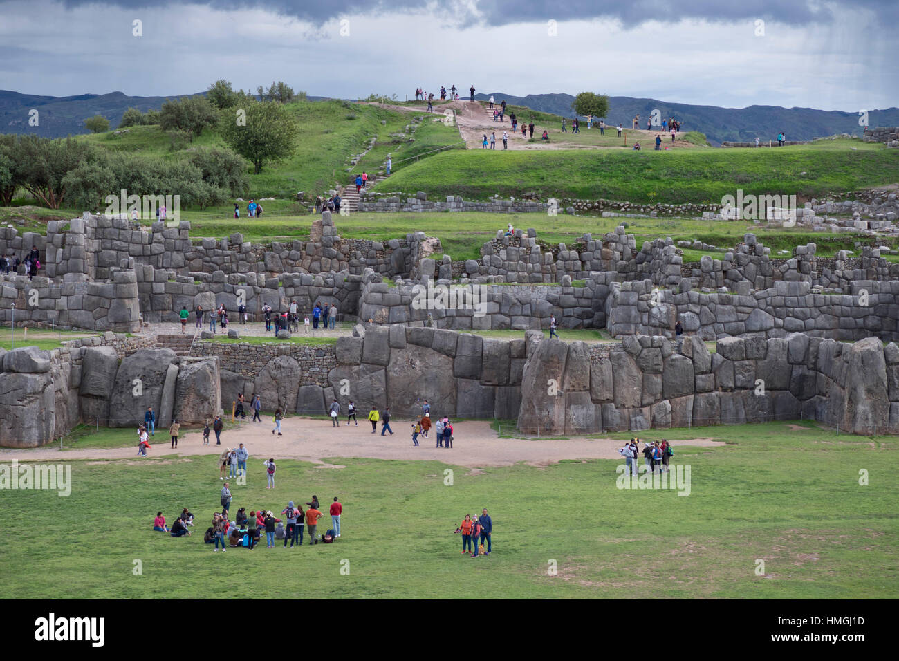 Tourists at the citadel of Sacsahuayman, a native Inca complex ...