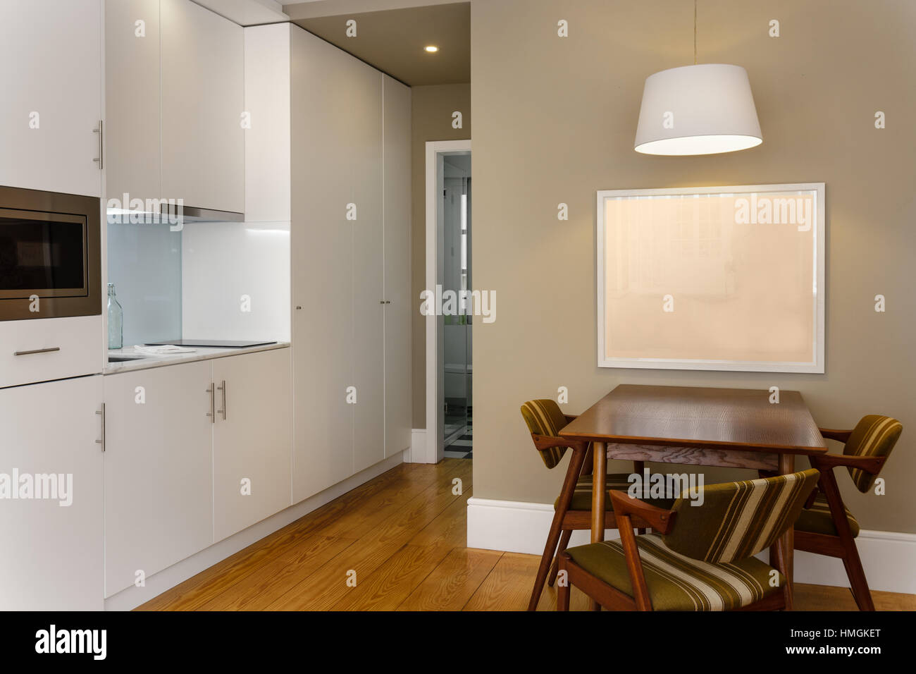 Beautiful Bright Kitchen and Dining Table Stock Photo - Alamy