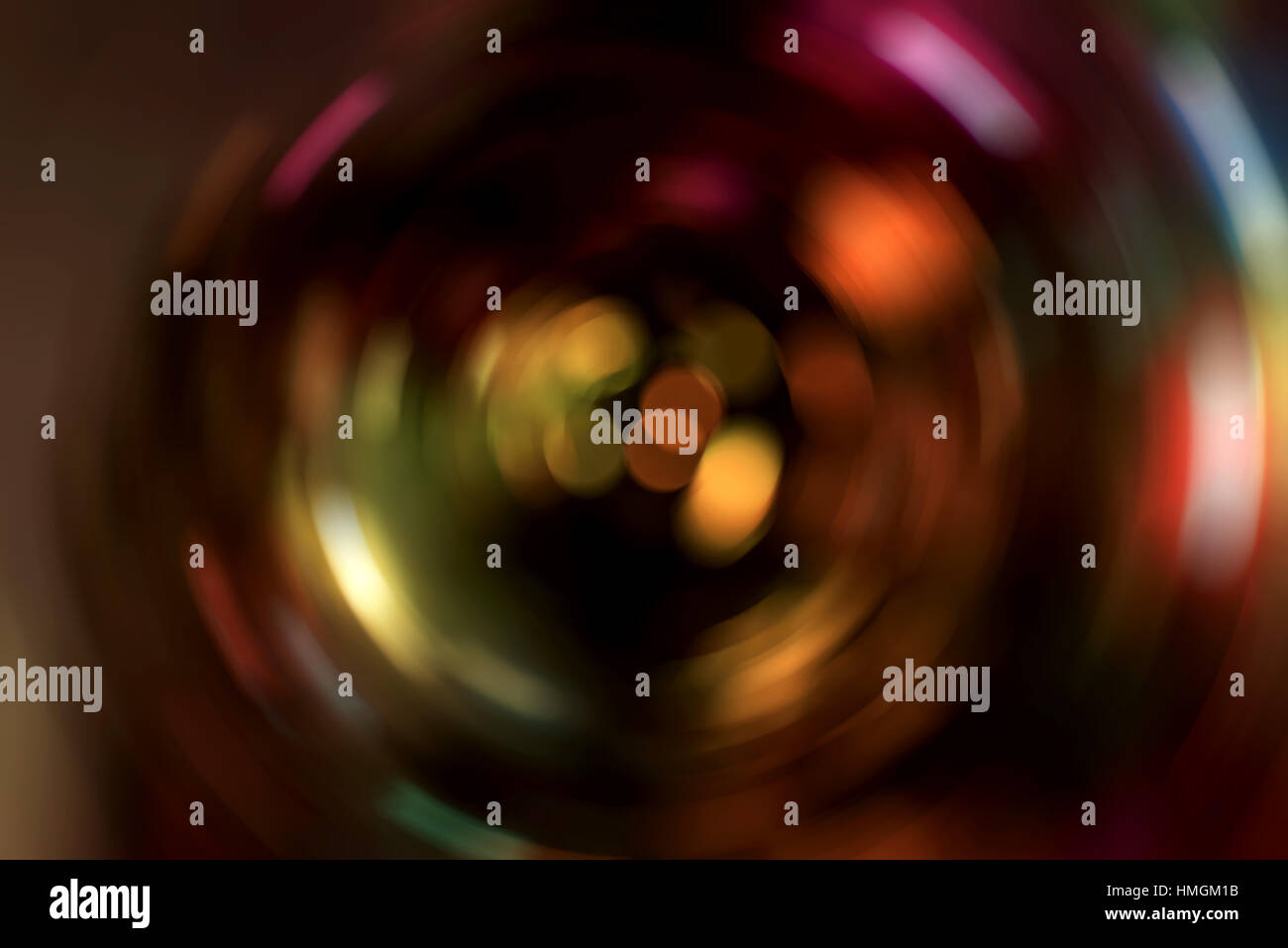 Abstract multicolored lights spinning around creating a whirl of ...