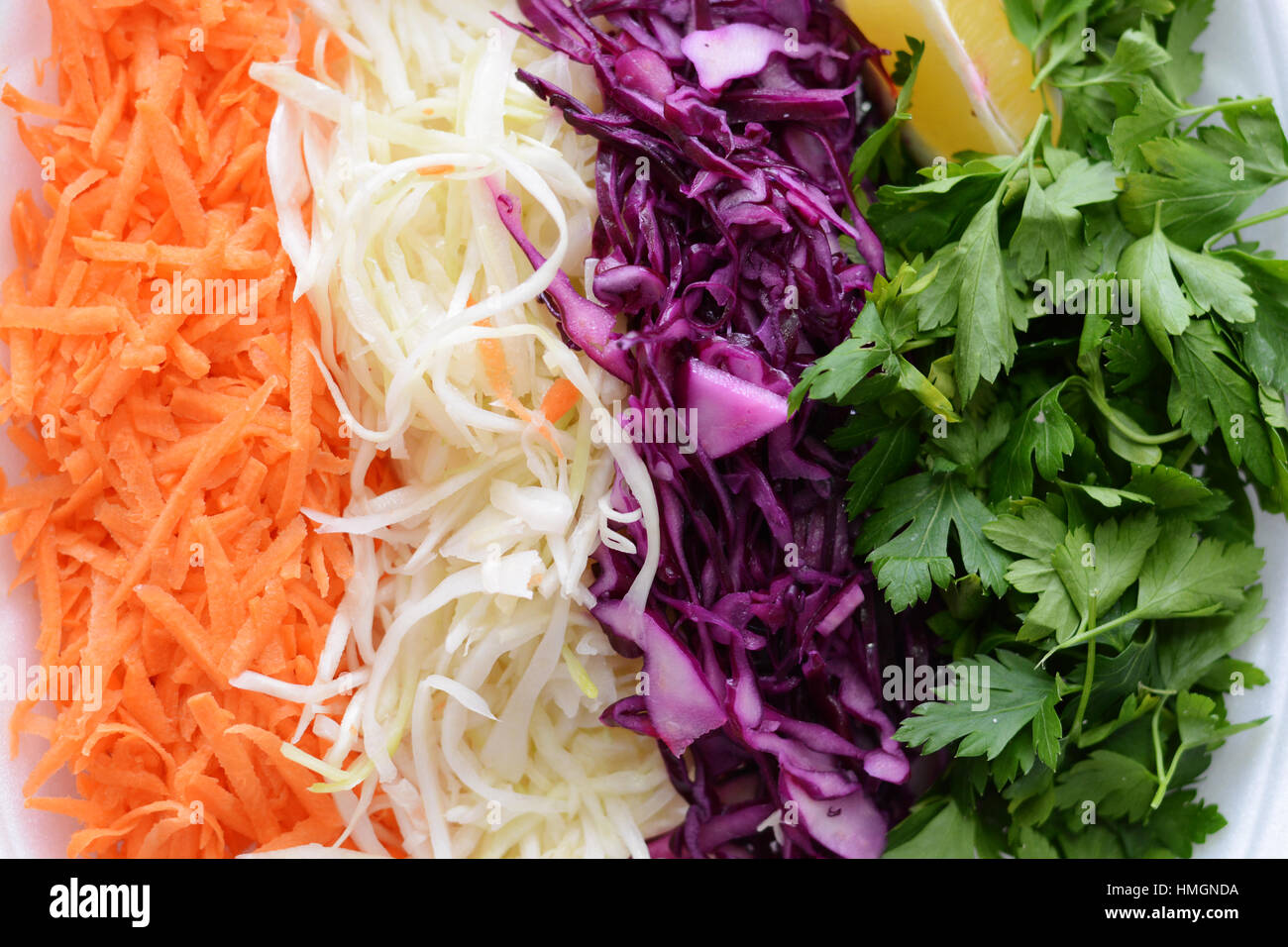 Colorful chopped vegetables in line on white casserole Stock Photo - Alamy