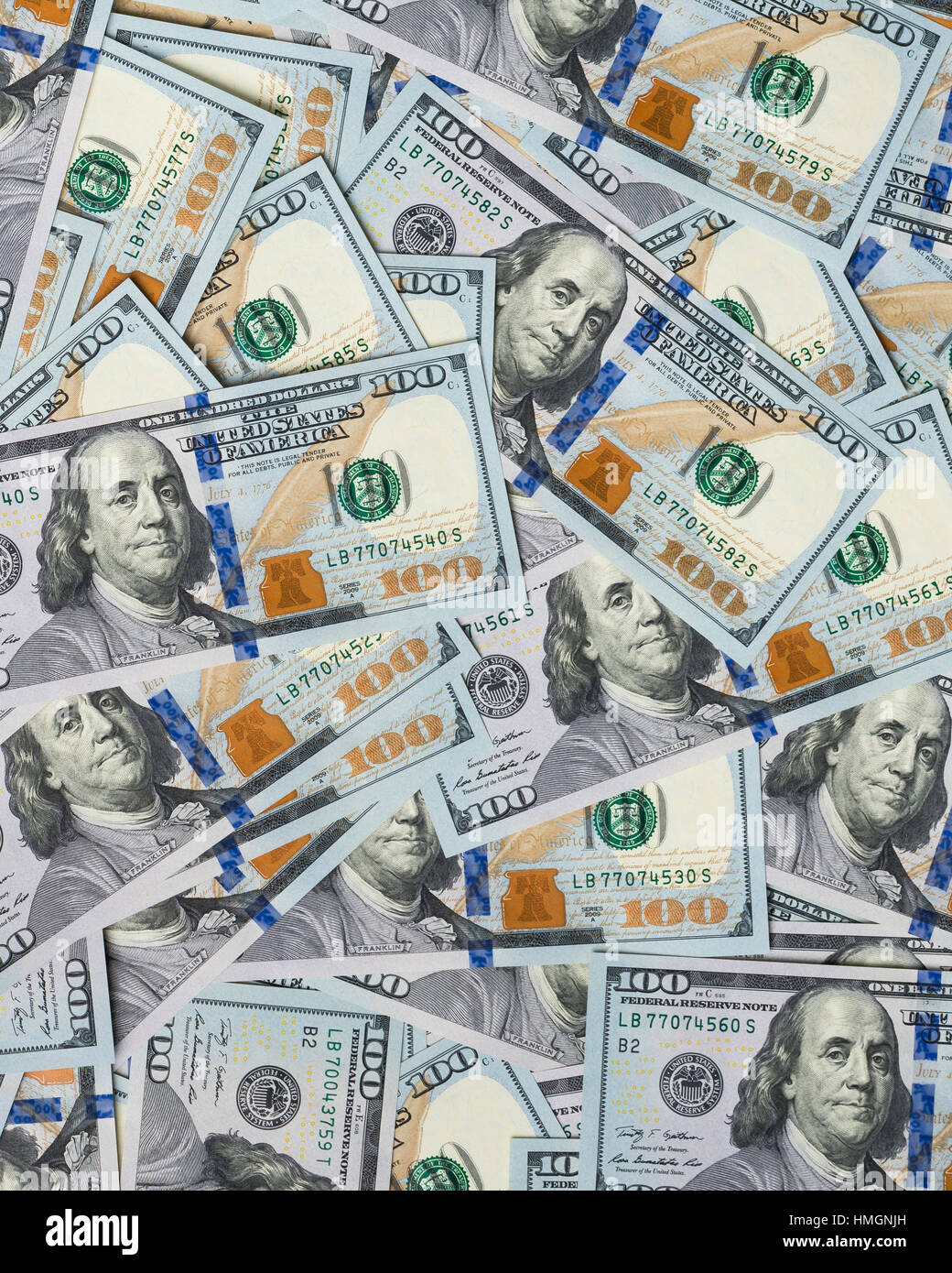 Heap of money in hundred dollar cash spread on surface Stock Photo - Alamy