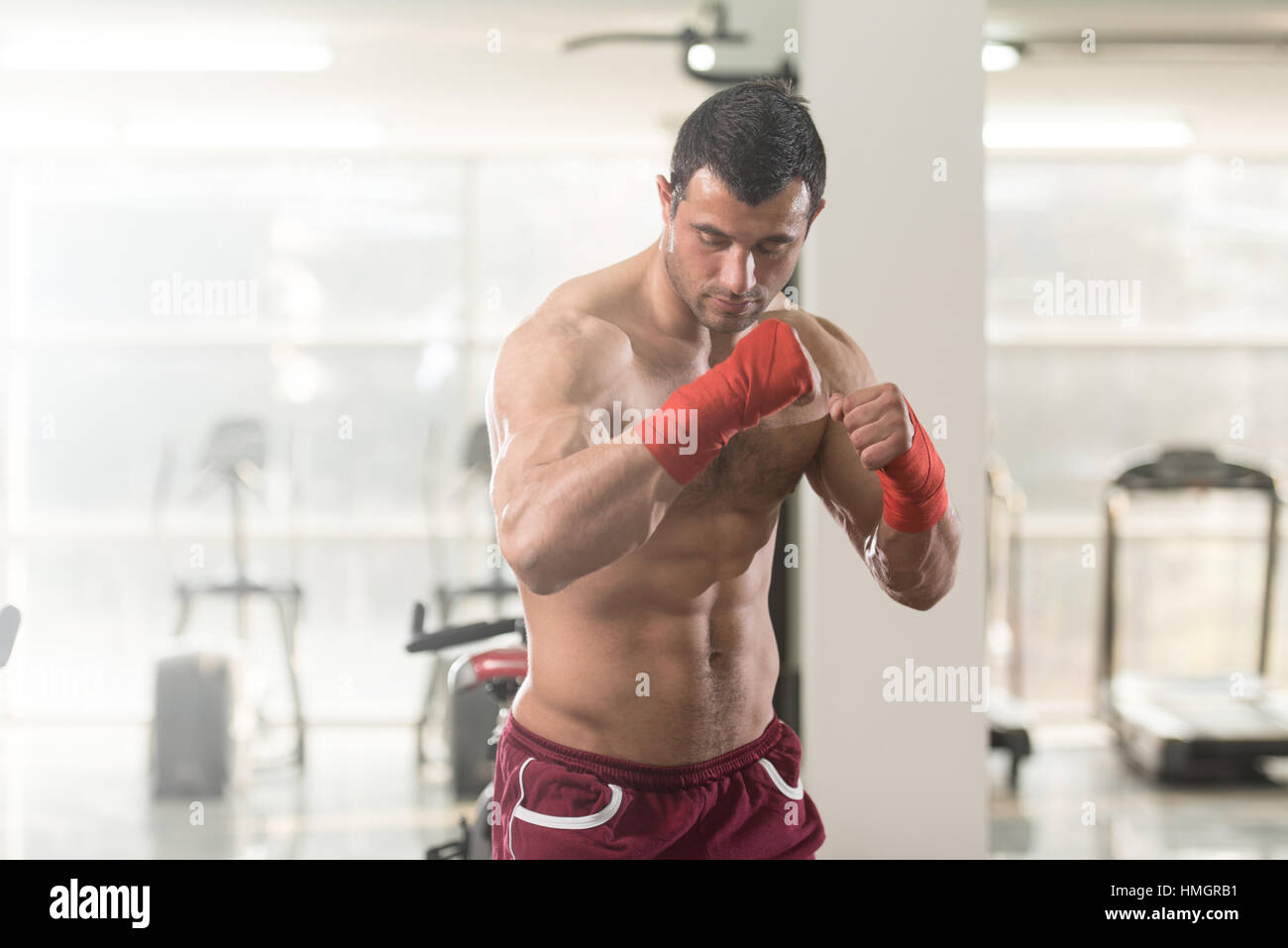 Handsome Man In Red Boxing Gloves - Boxing In Gym - The Concept Of A ...