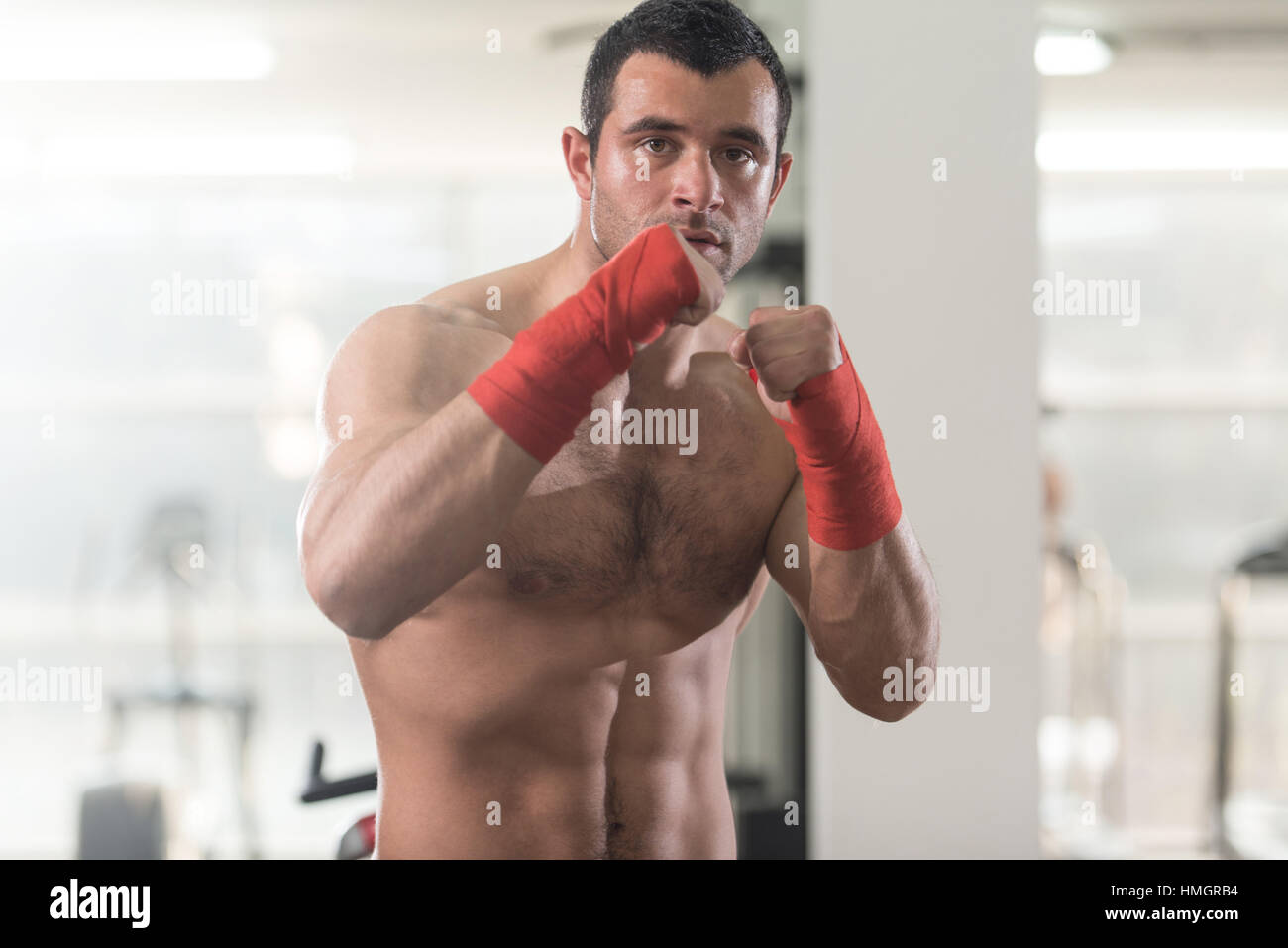 Handsome Man In Red Boxing Gloves - Boxing In Gym - The Concept Of A ...