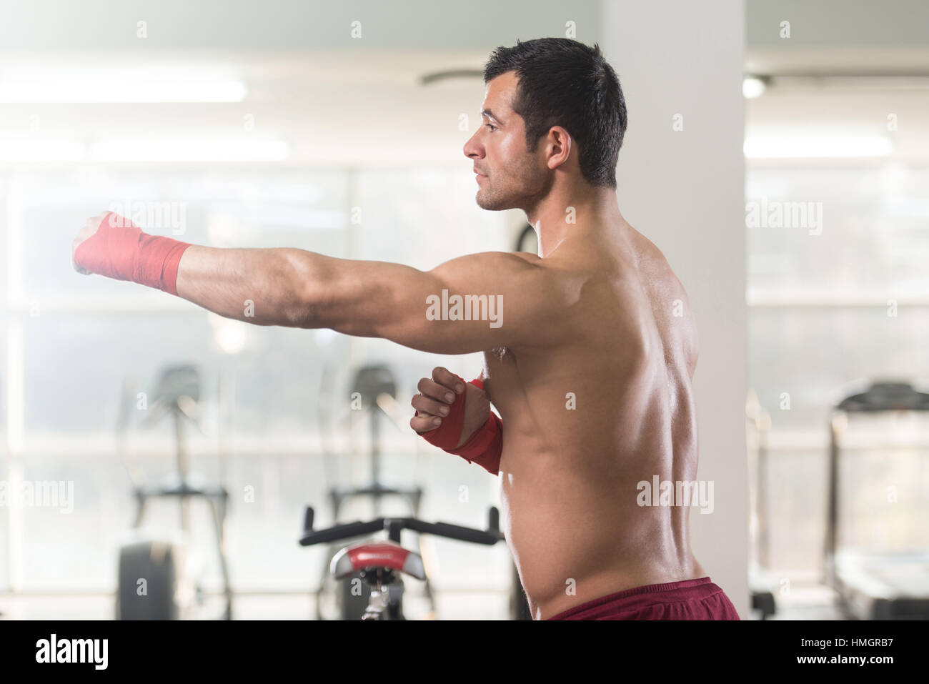 Handsome Man In Red Boxing Gloves - Boxing In Gym - The Concept Of A ...