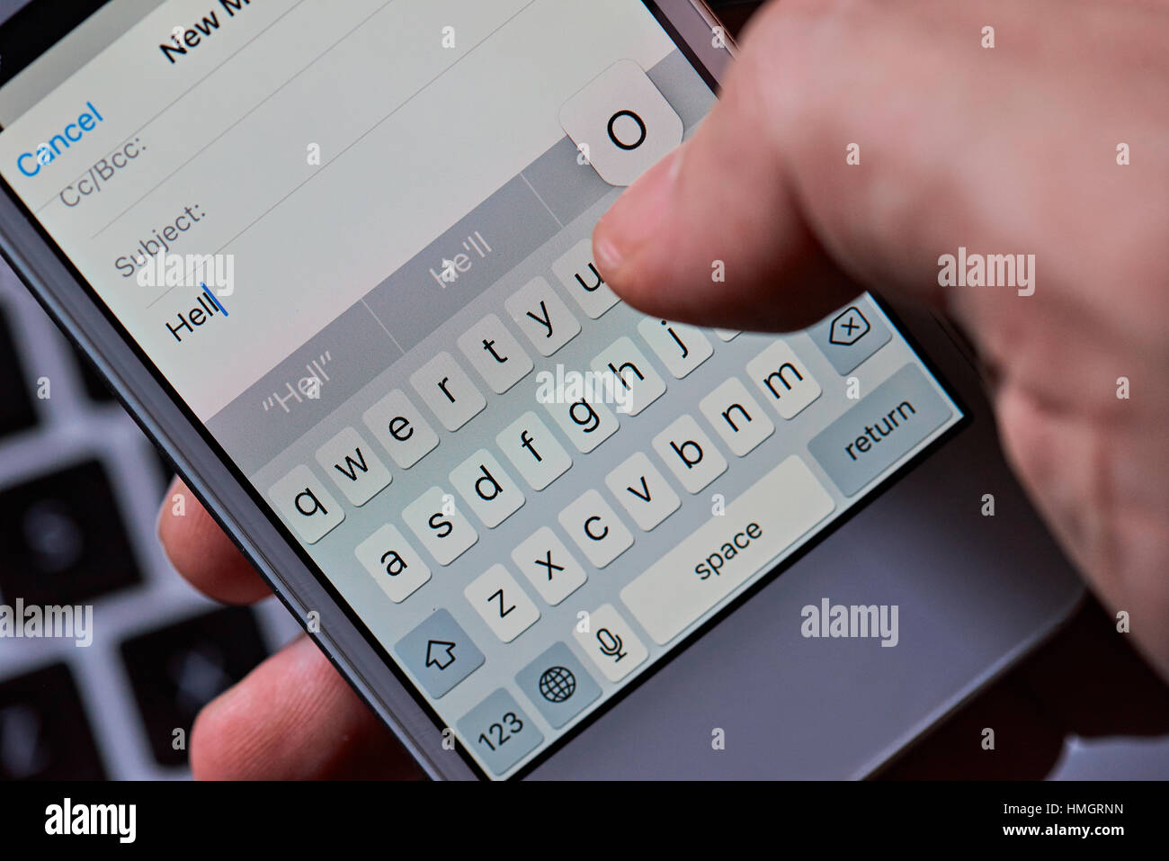 finishing typing hello word on screen of smartphone Stock Photo - Alamy