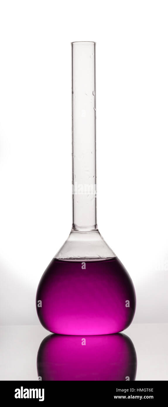 Chemical flask with liquid on a white background Stock Photo - Alamy