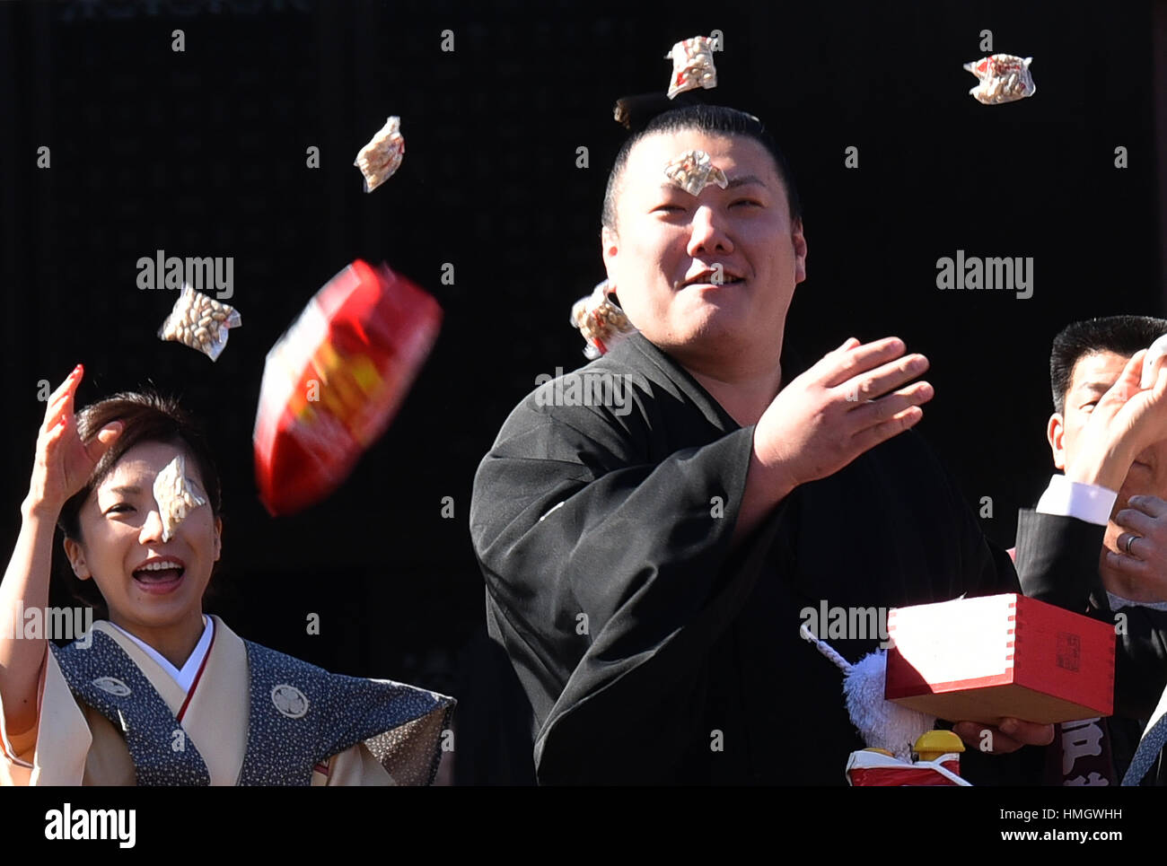 Tokyo, Japan. 3rd Feb, 2017. Sumo wrestlers and celebrities throw out ...