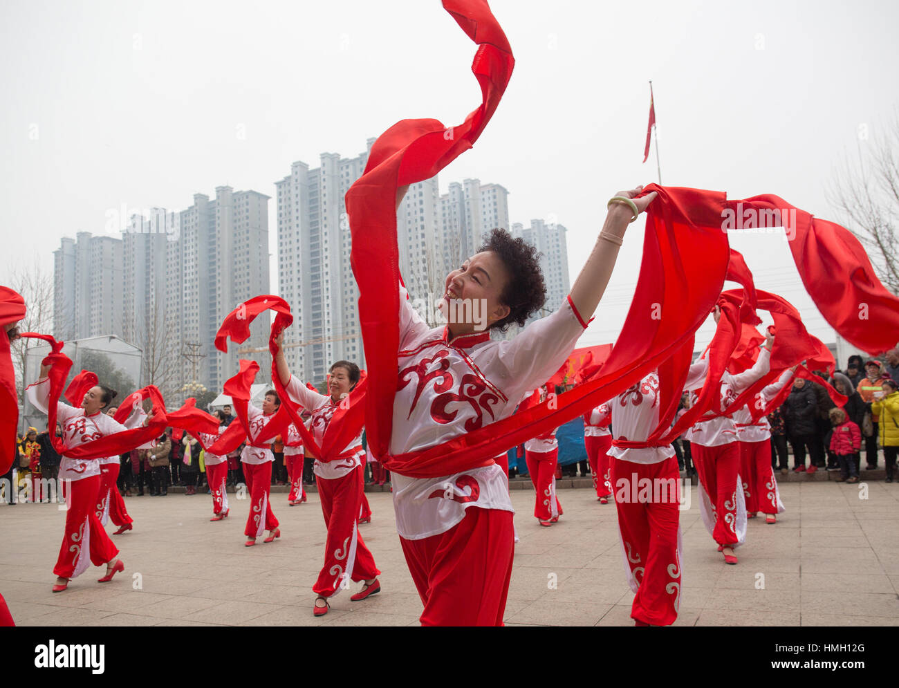 Linyi, China's Shandong Province. 3rd Feb, 2017. People take part in a ...