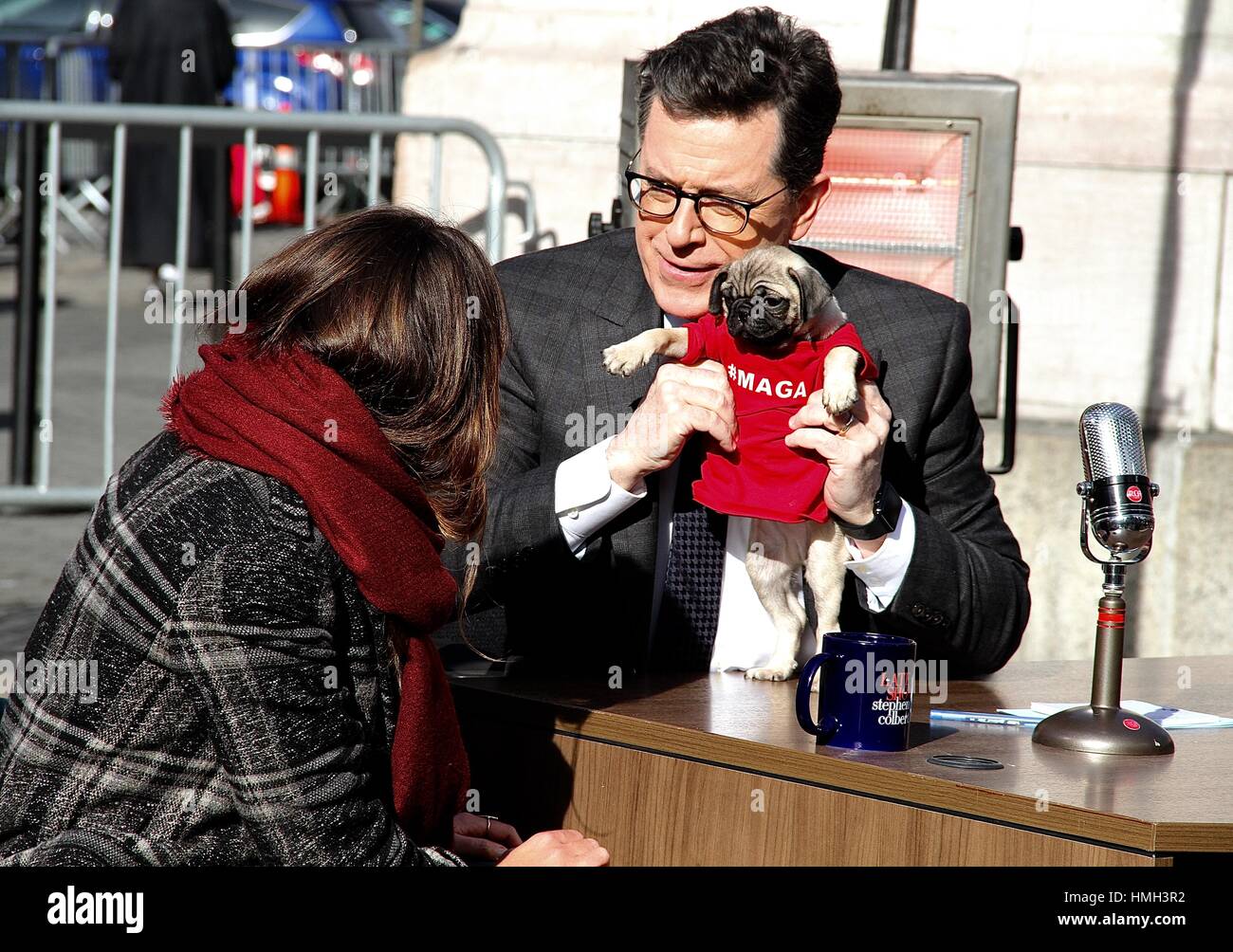 New York, USA. 3rd Feb, 2017. Stephen Colbert plays with a dog wearing ...