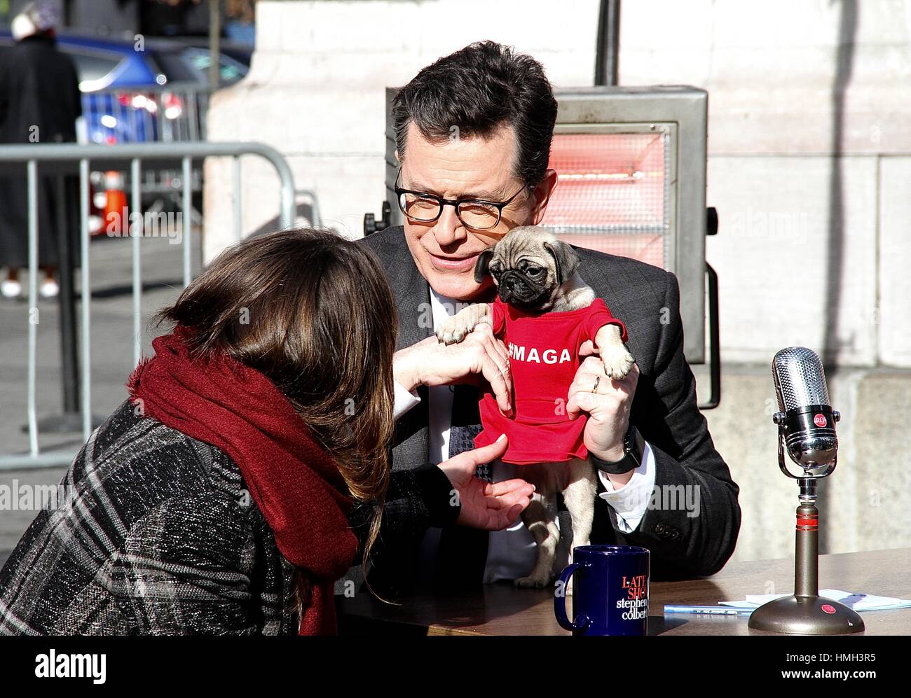 New York, USA. 3rd Feb, 2017. Stephen Colbert plays with a dog wearing ...