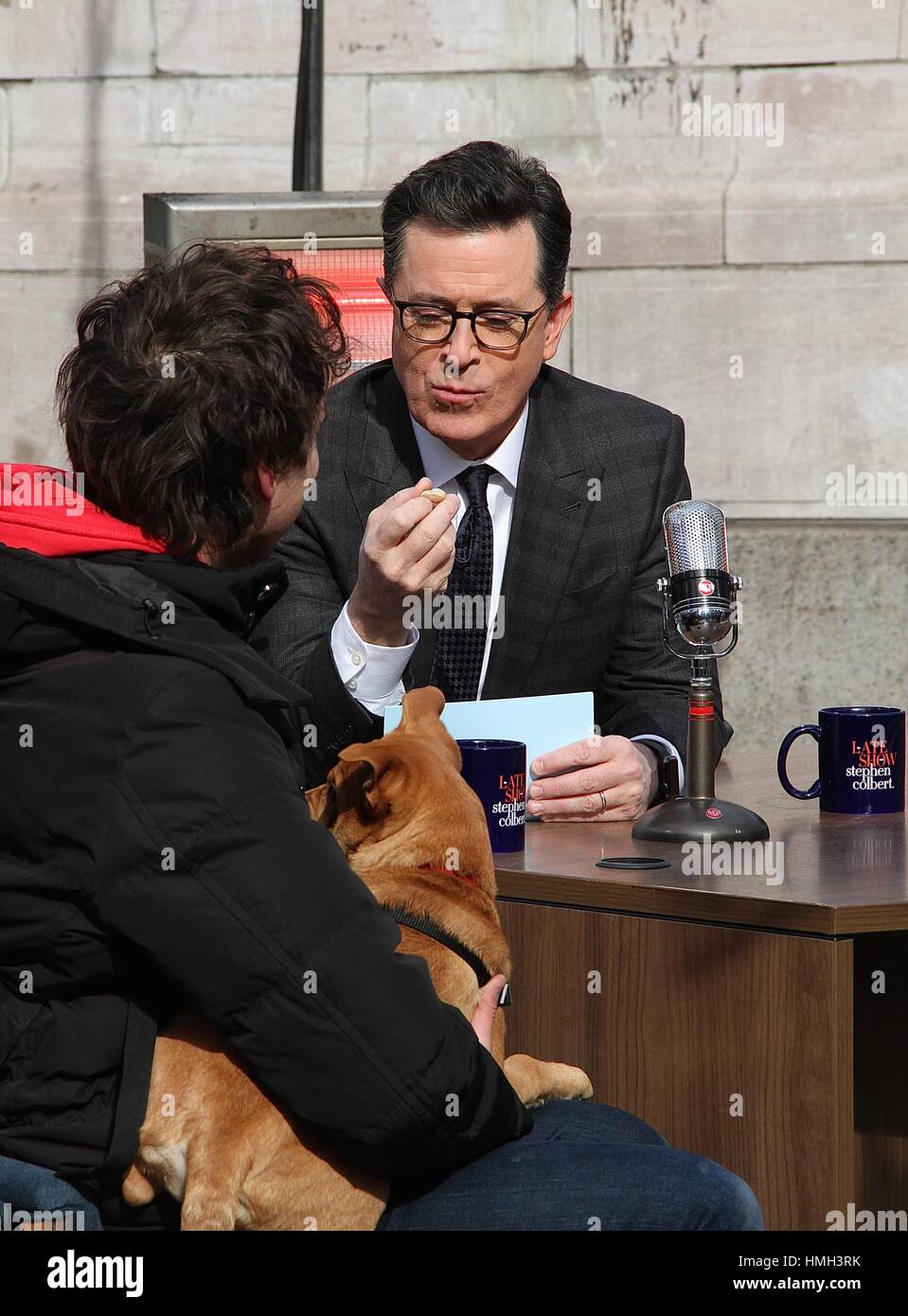 New York, USA. 3rd Feb, 2017. Stephen Colbert tries a Milk Bone dog ...