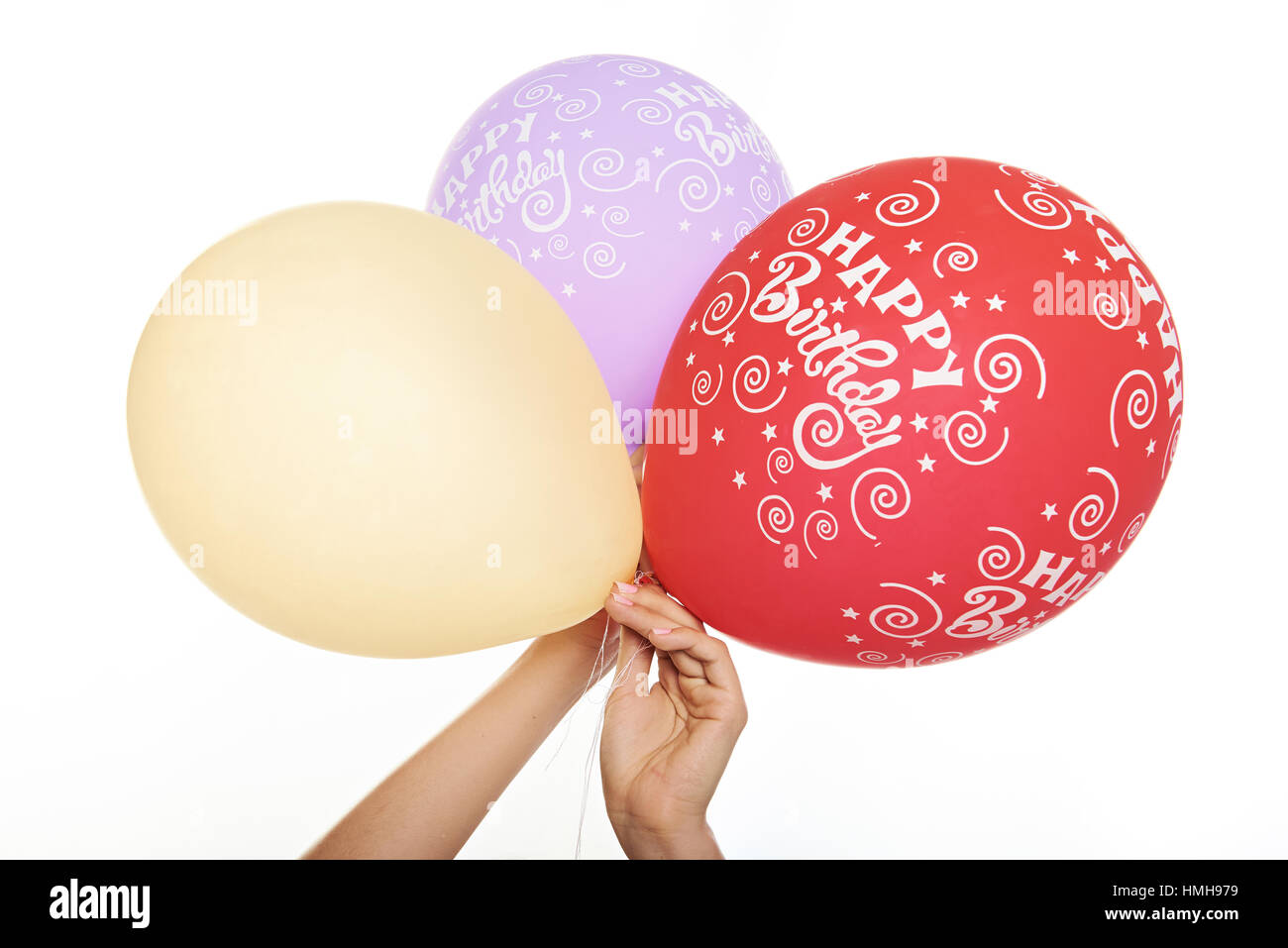 colourful balloons in hands isolated on white Stock Photo - Alamy