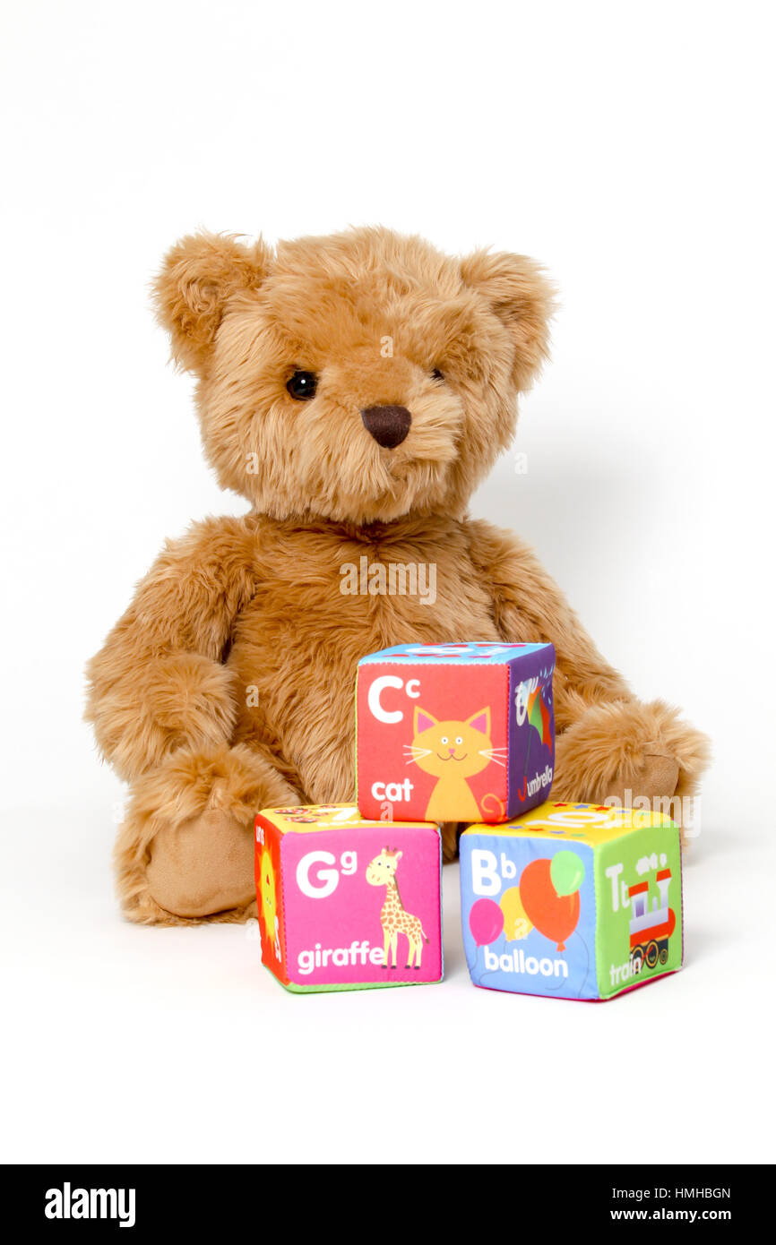 Children's Teddy Bear with Toy Building Blocks Stock Photo - Alamy