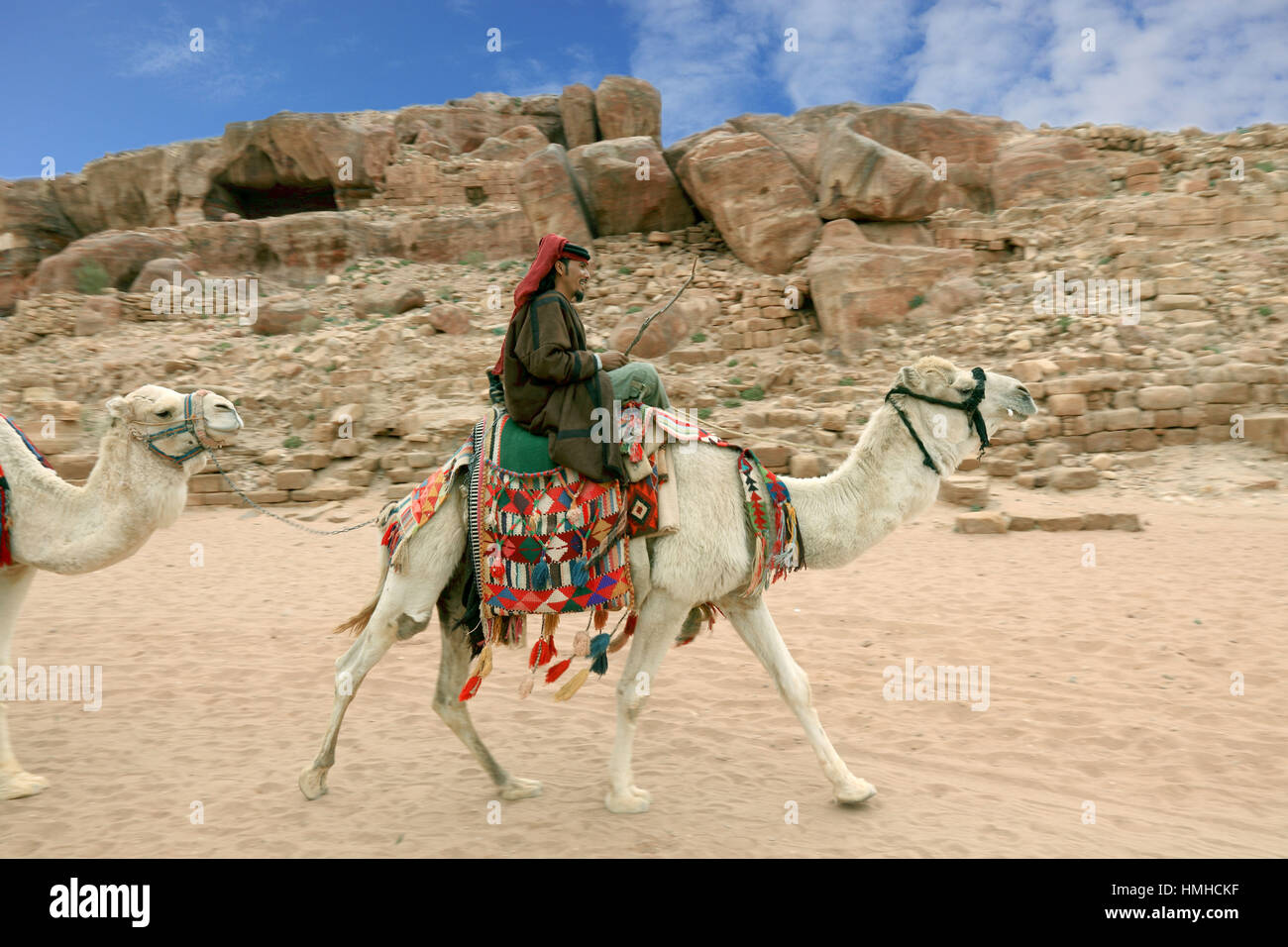 Bedouin with riding camel, abandoned rock city Petra, al-Batra, capital ...
