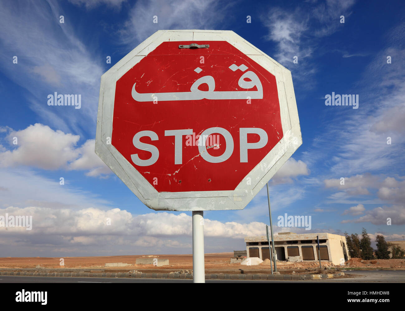 Stop sign in Arabic, here in Jordan Stock Photo - Alamy