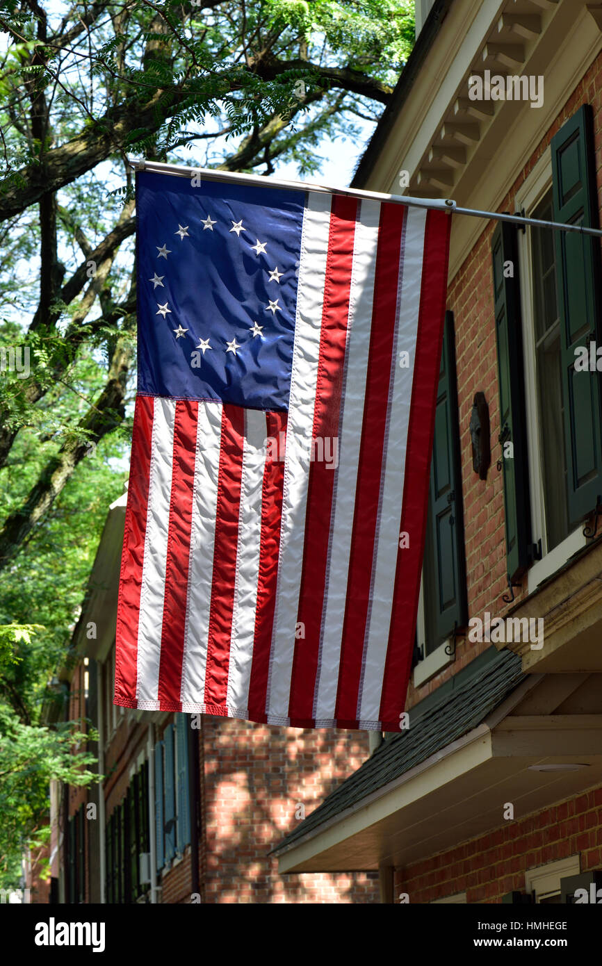 Colonial US flag hanging from a home in Old City Philadelphia Stock ...