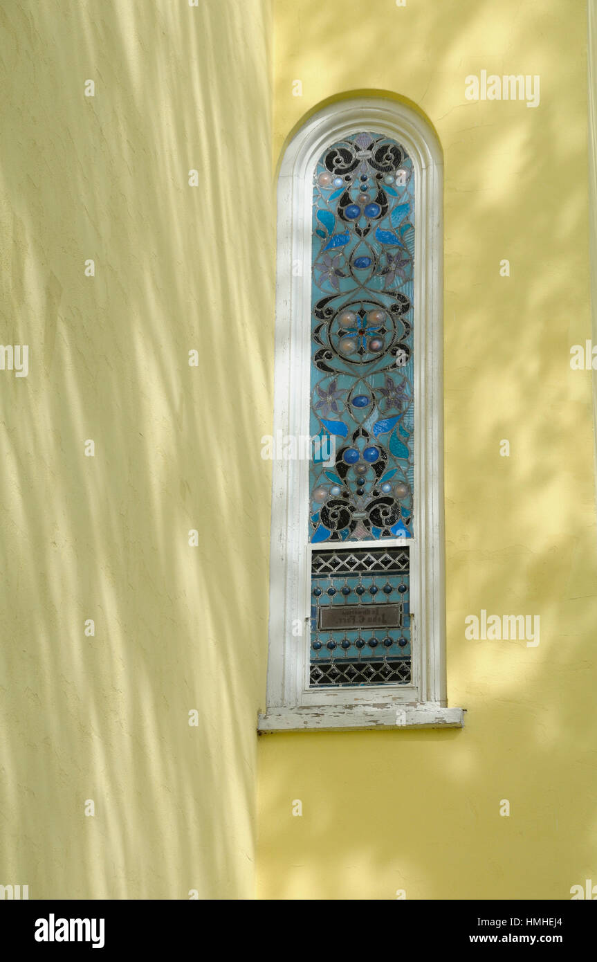 Narrow stained glass window on a church in old city Philadelphia, PA ...