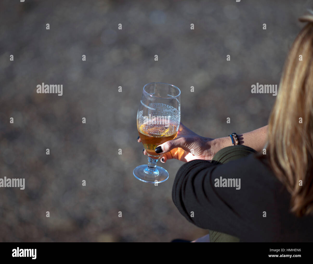 Woman drinking by the river, London United Kingdom Stock Photo - Alamy