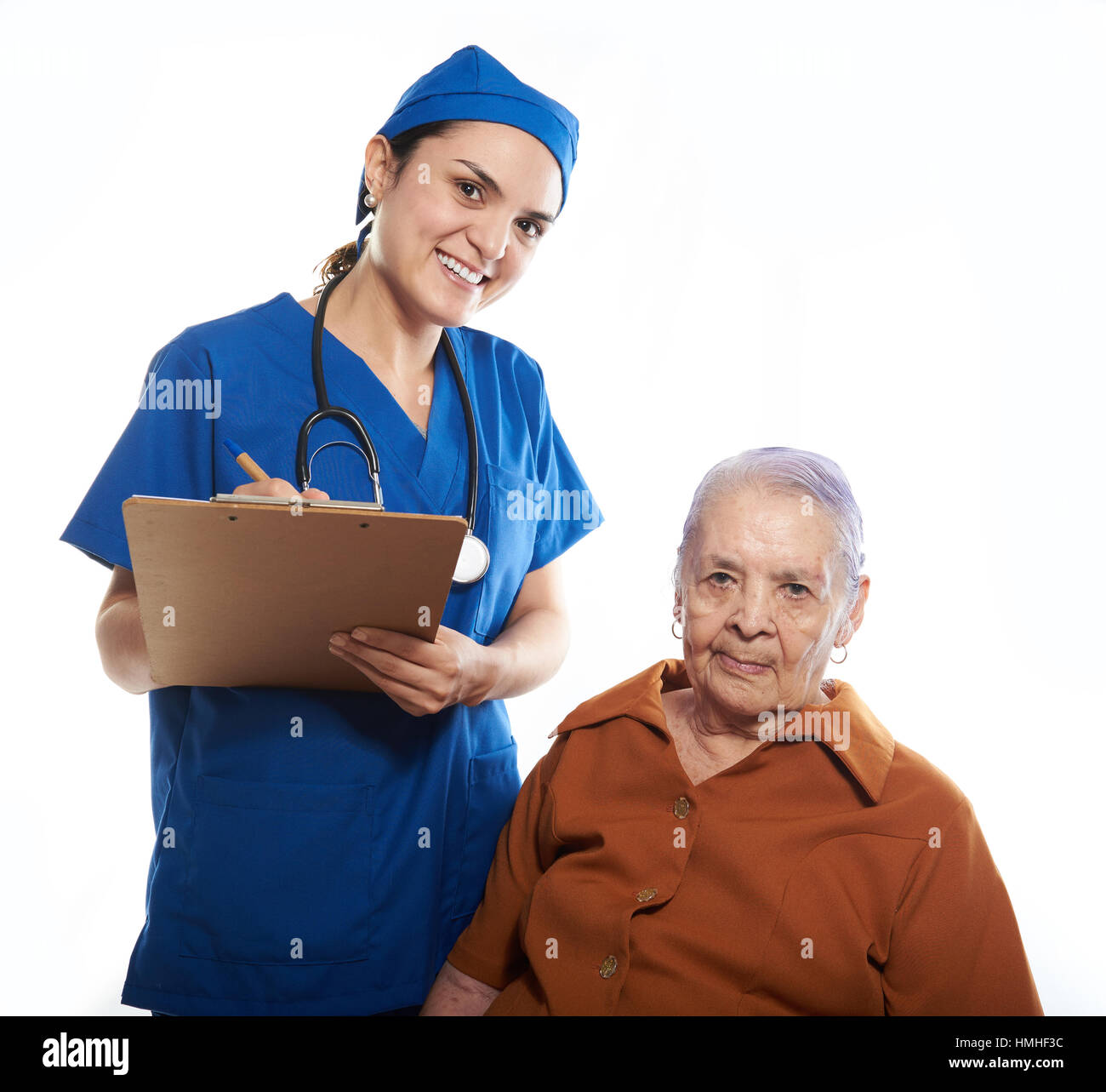 friendly nurse help old woman isolated on white Stock Photo - Alamy
