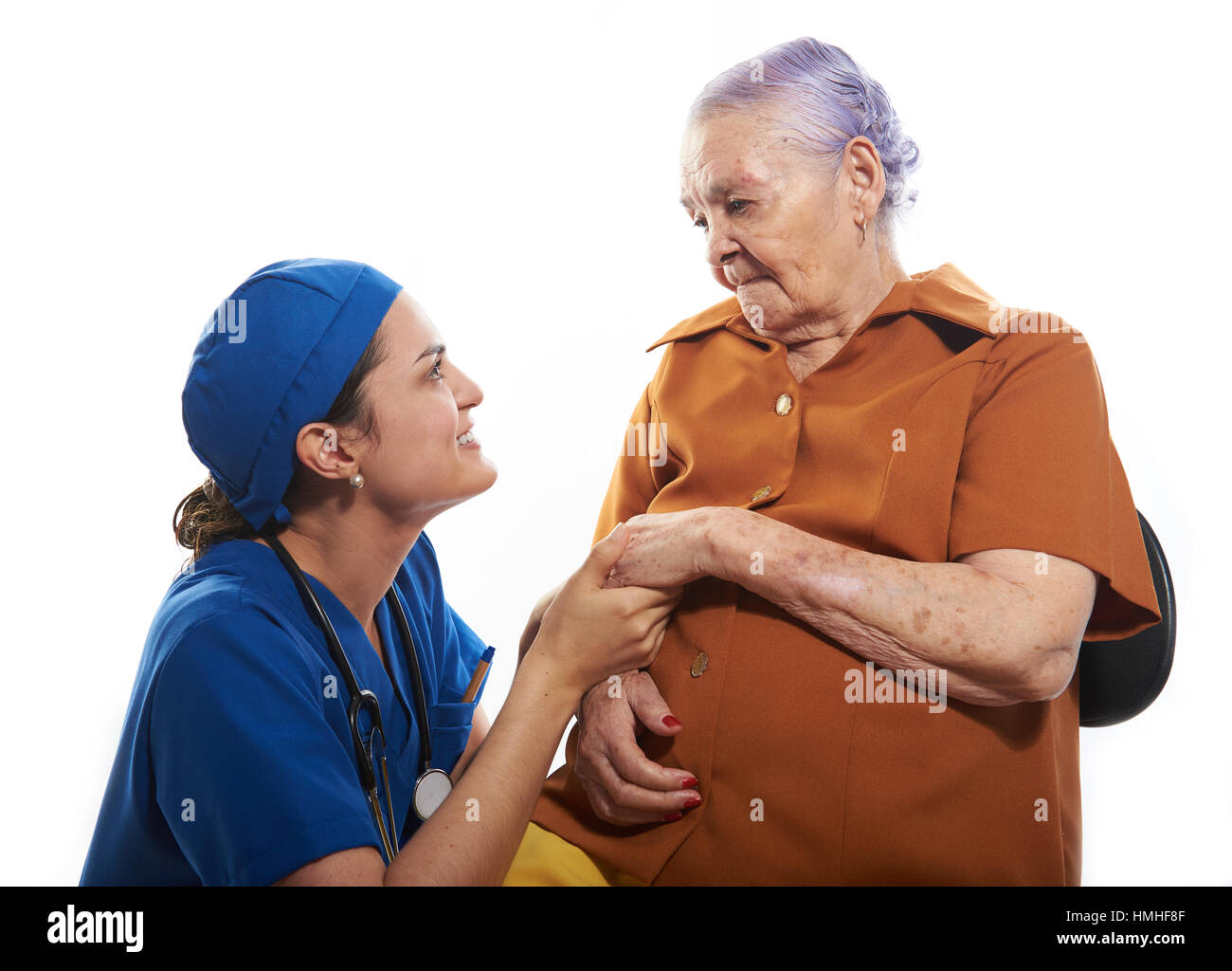 nurse help old woman isolated on white Stock Photo - Alamy nurse help old woman isolated on white Stock Photo - Alamy