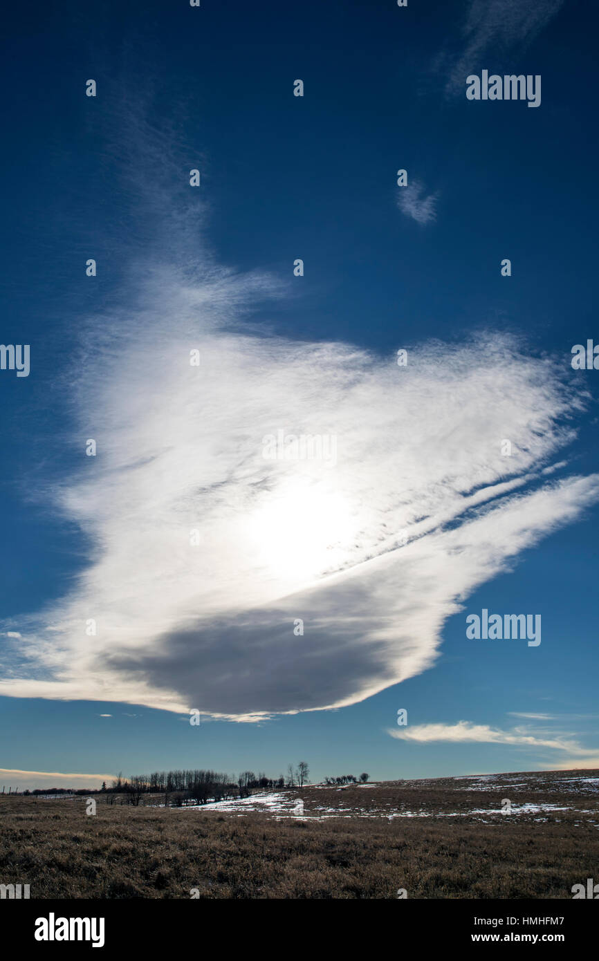 Unusual cloud formations against blue sky; Alberta; Canada Stock Photo ...