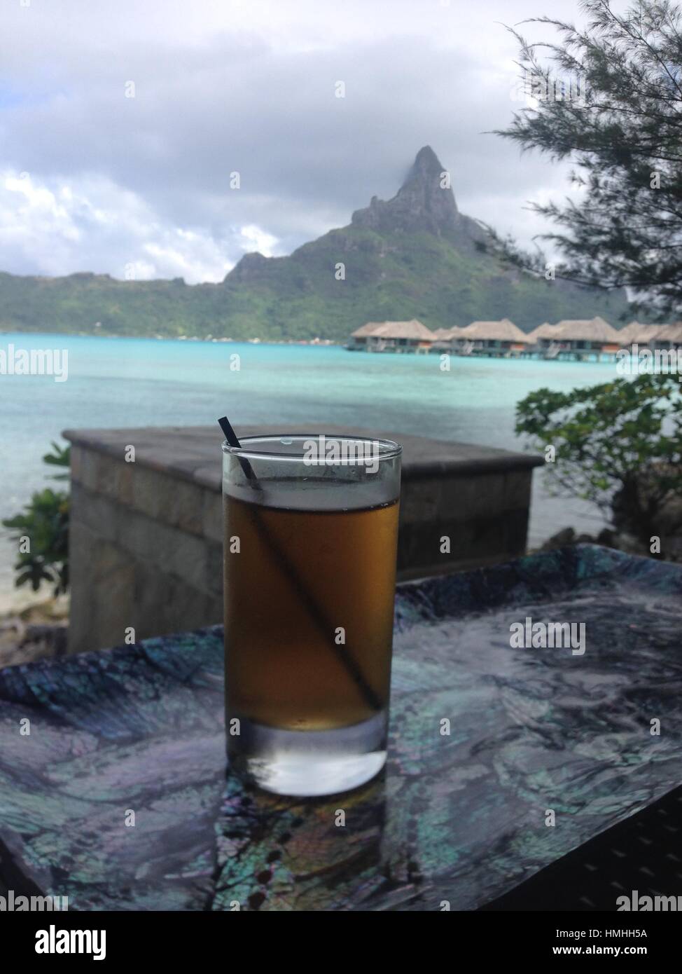 relax with a glass of tea in bora bora Stock Photo - Alamy