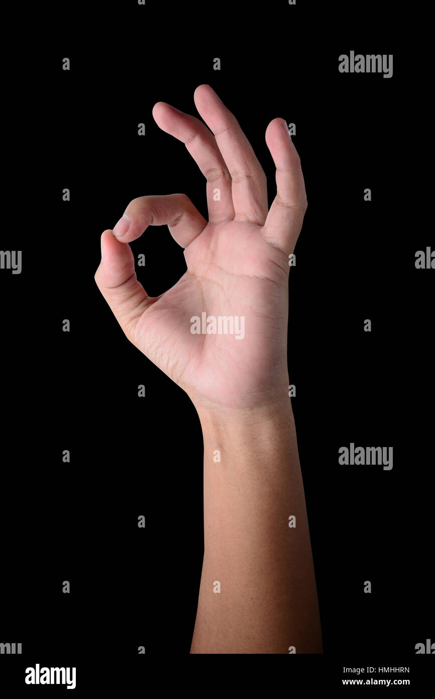 Hand OK sign on isolated on black with clipping path Stock Photo - Alamy