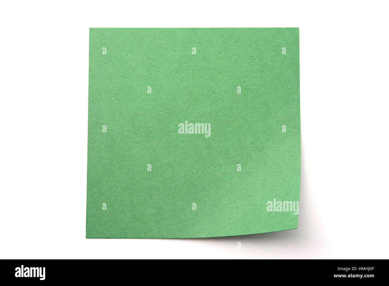 Dark green paper stick note on a white background Stock Photo - Alamy