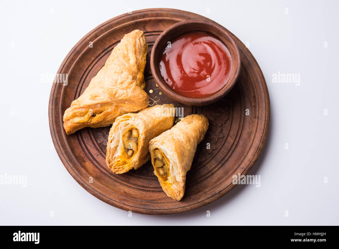 Save Download Preview stuffed vegetable or veg puff or puf or samosa ...