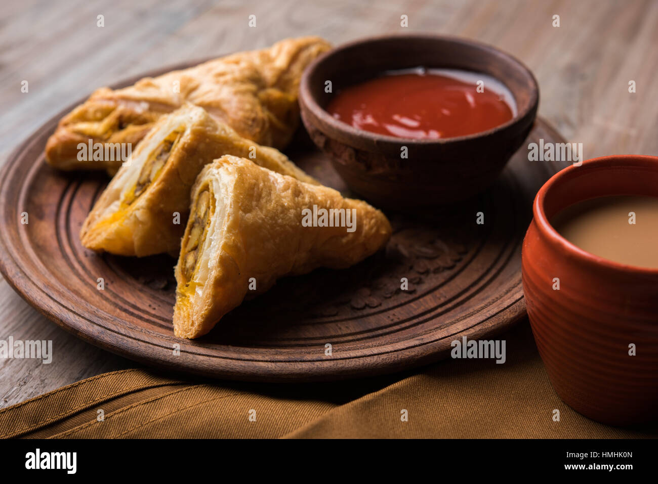 Save Download Preview stuffed vegetable or veg puff or puf or samosa ...
