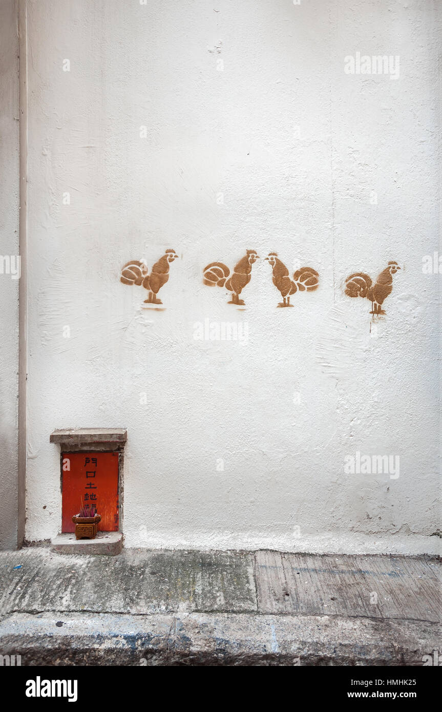 Street shrine to the earth god Tu Di in Sheung Wan, Hong Kong. The text ...