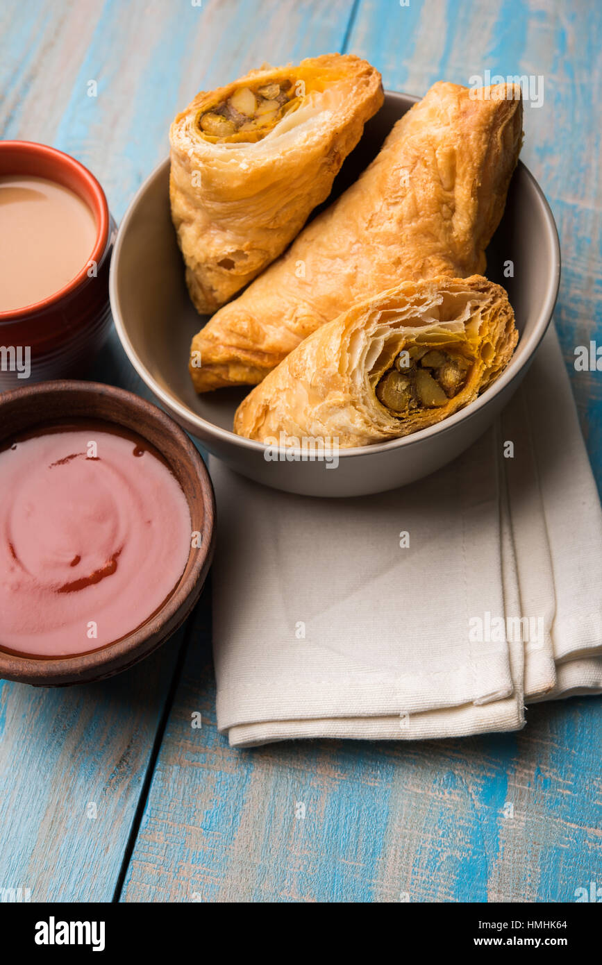 Save Download Preview stuffed vegetable or veg puff or puf or samosa ...