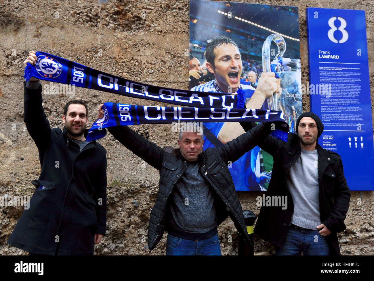 Chelsea fans hold up scarves in front of the Frank Lampard memorial as ...