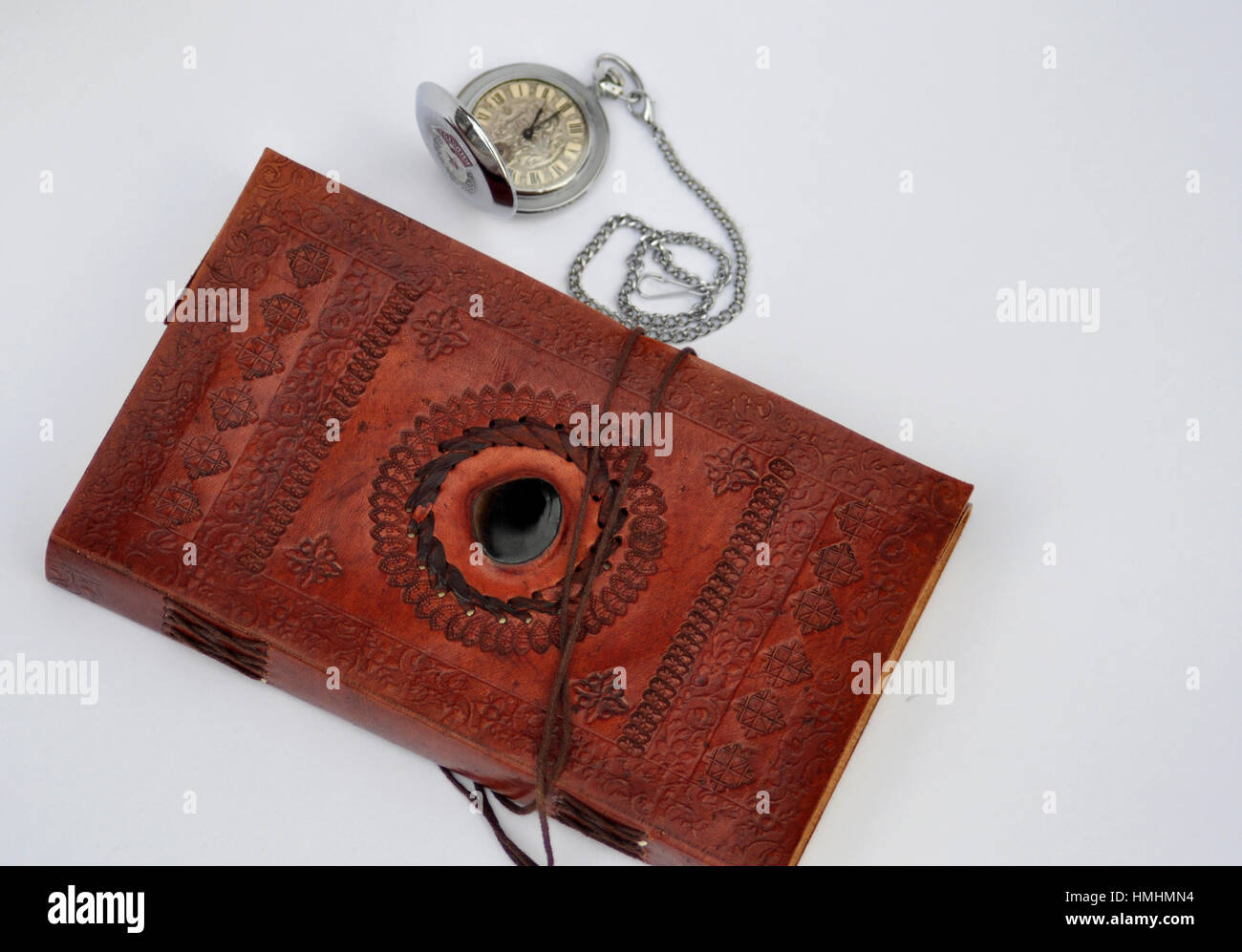 Romantic scene with notebook and long chain of pocket watch Stock Photo ...