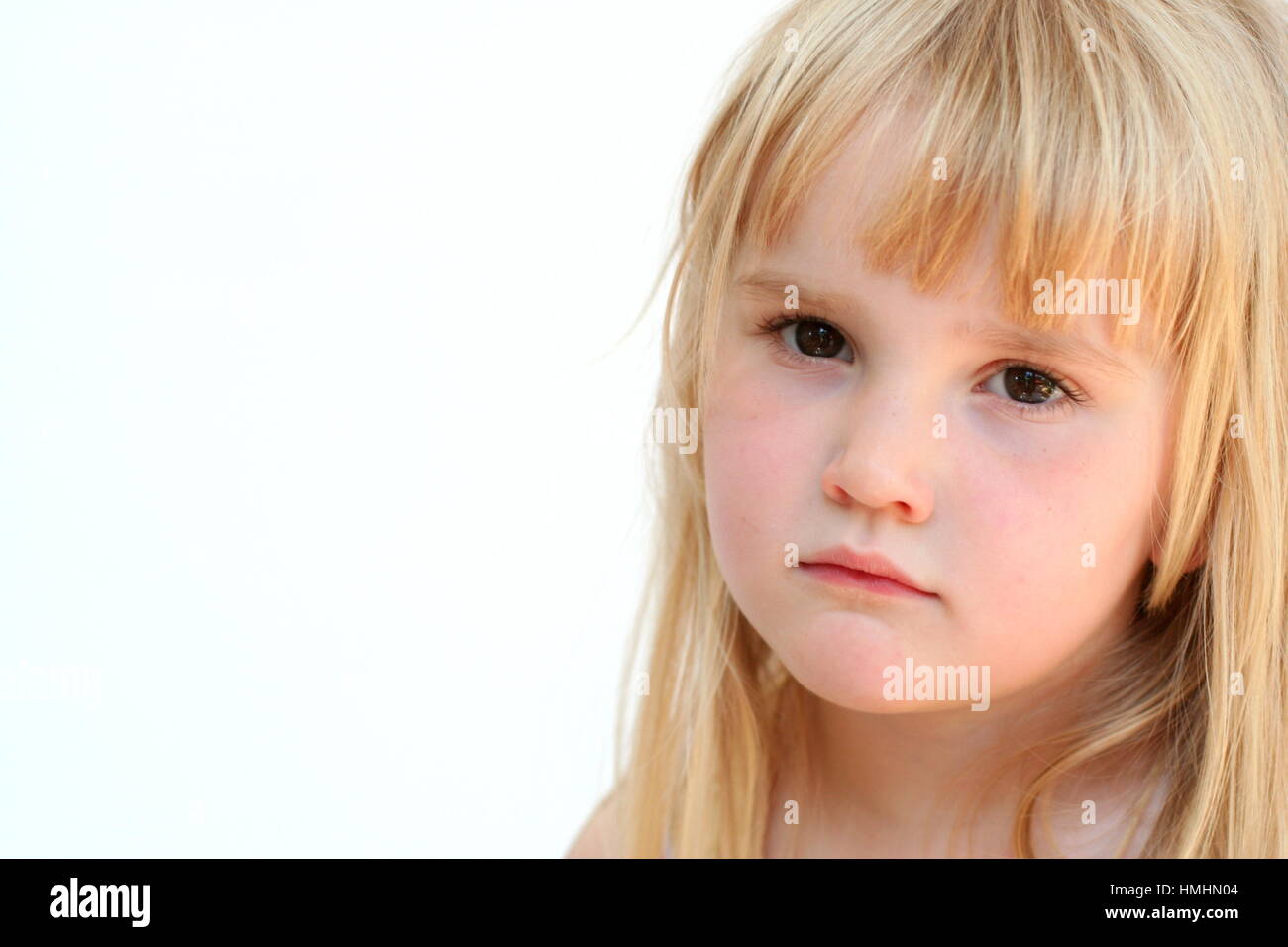 Little girl child kid, looking annoyed grumpy, upset fed up exhausted ...