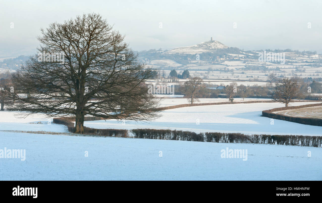 Glastonbury Tor at dawn on a snowy winter morning Stock Photo - Alamy