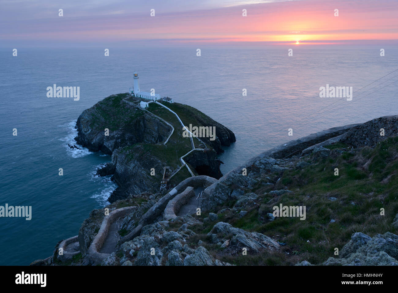 South Stack Lighthouse, Anglesey, during a colourful sunset Stock Photo ...