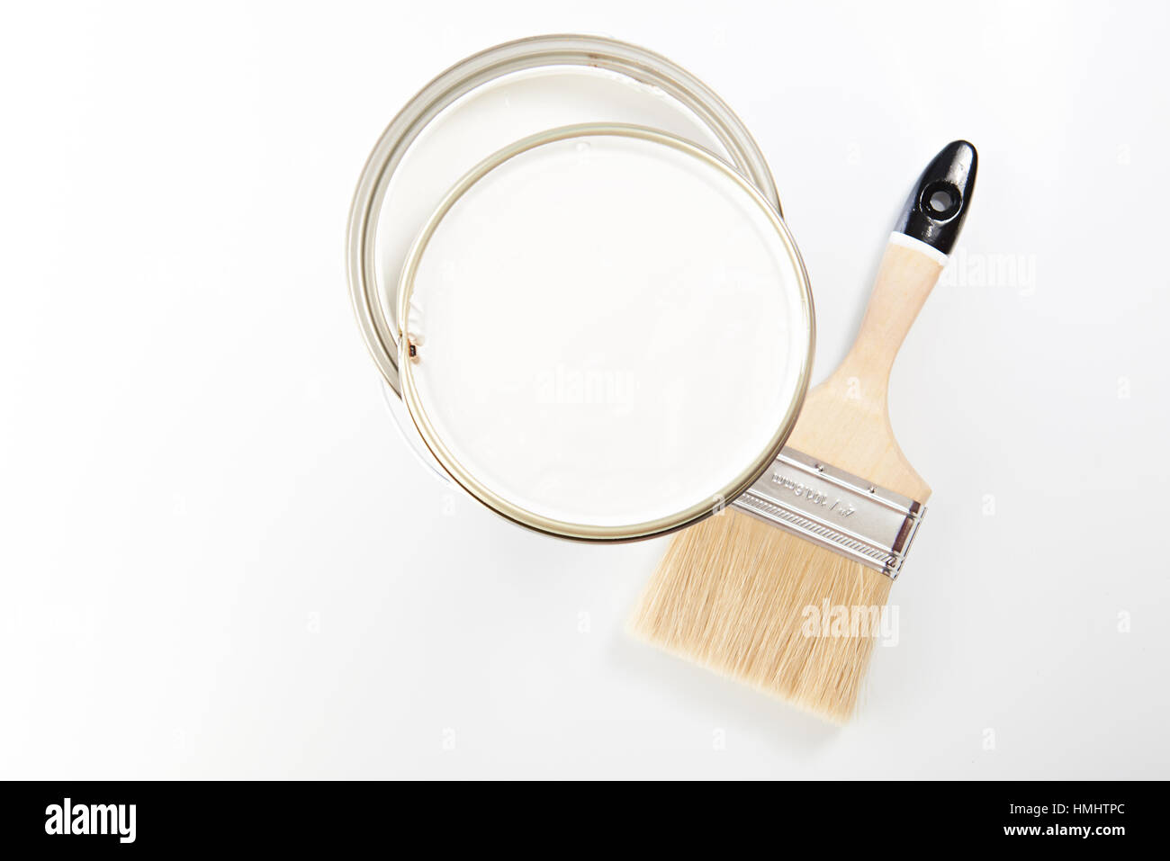 white paint in bucket with brush top view isolated Stock Photo - Alamy