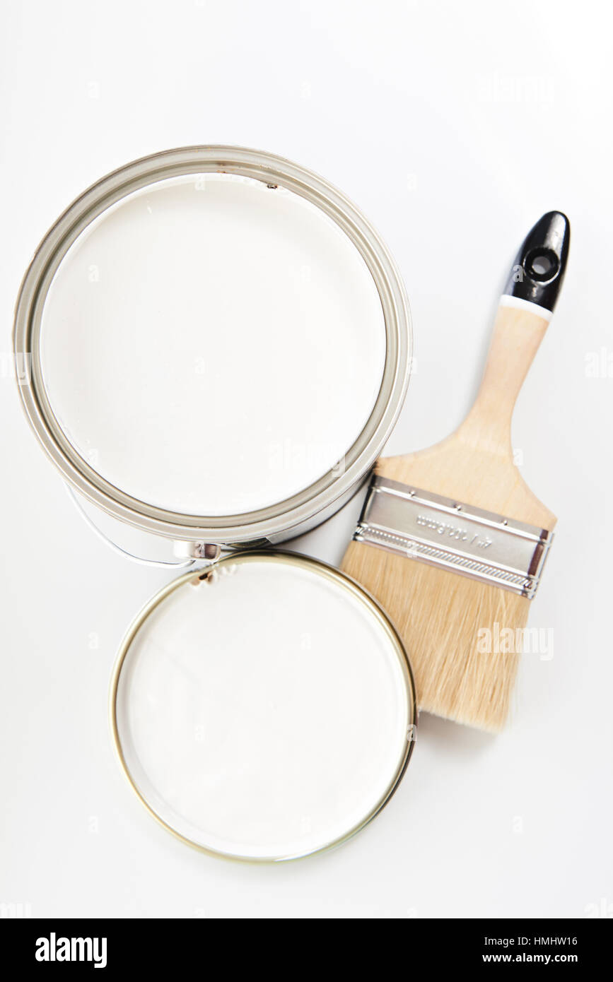 open bucket with white paint and brush isolated Stock Photo - Alamy