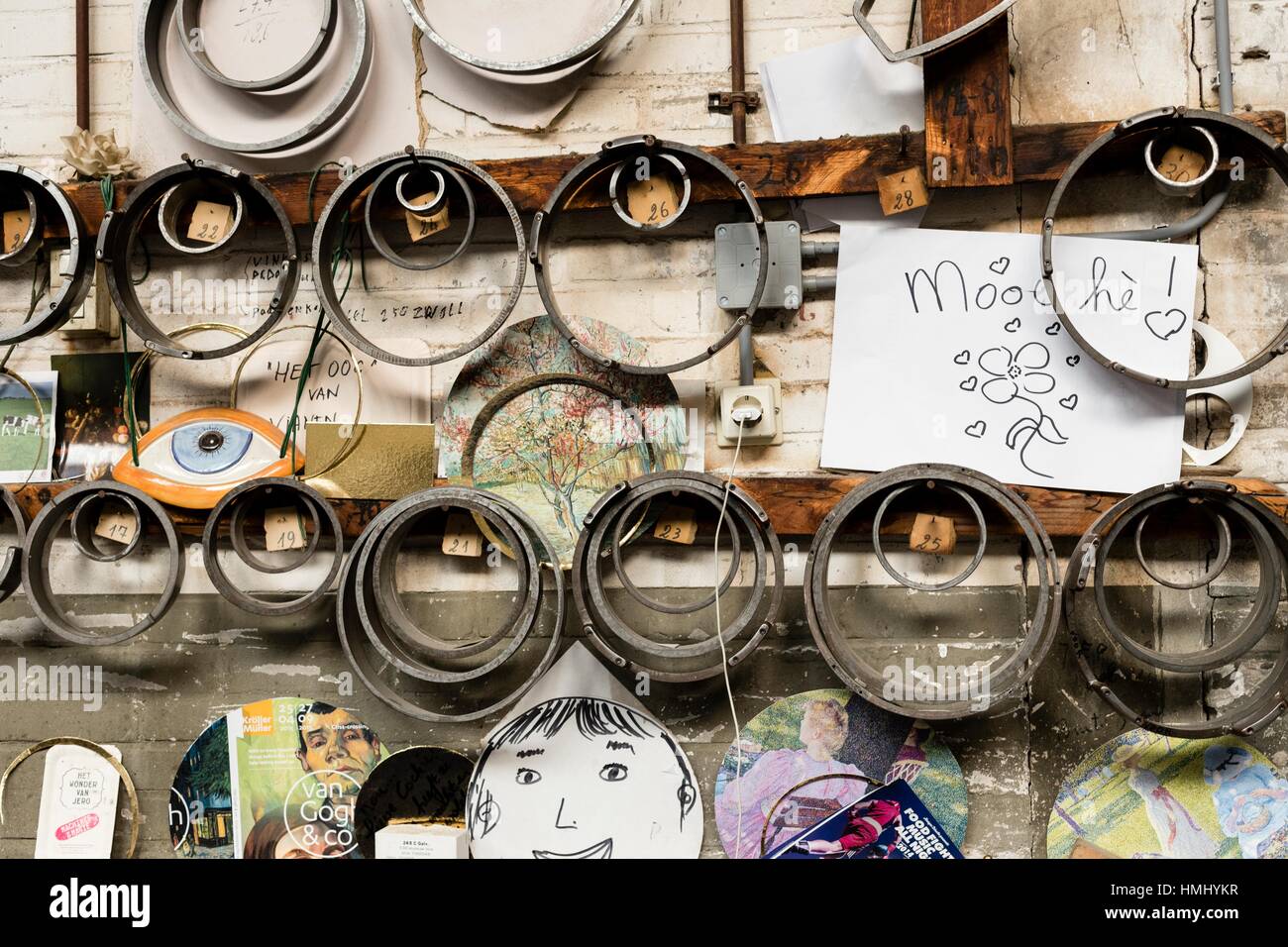 Molds to cut cardboard in an old factory wall Stock Photo - Alamy
