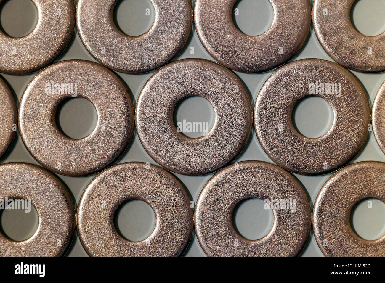 Joiner's accessories. Stacks of metal screw washers isolated on white ...