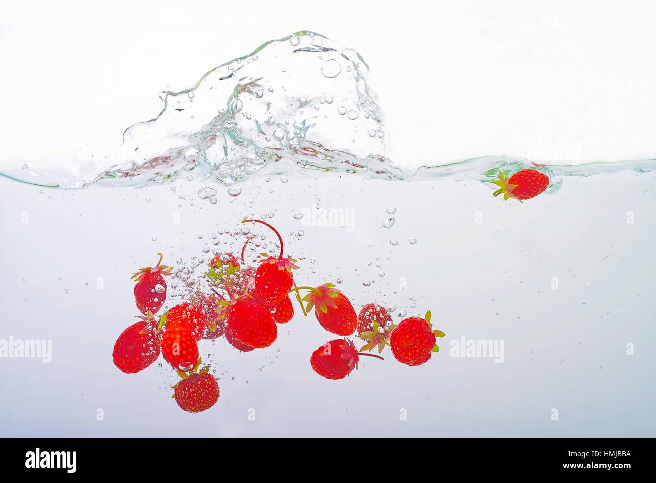 Strawberry(ies) thrown into water Stock Photo - Alamy