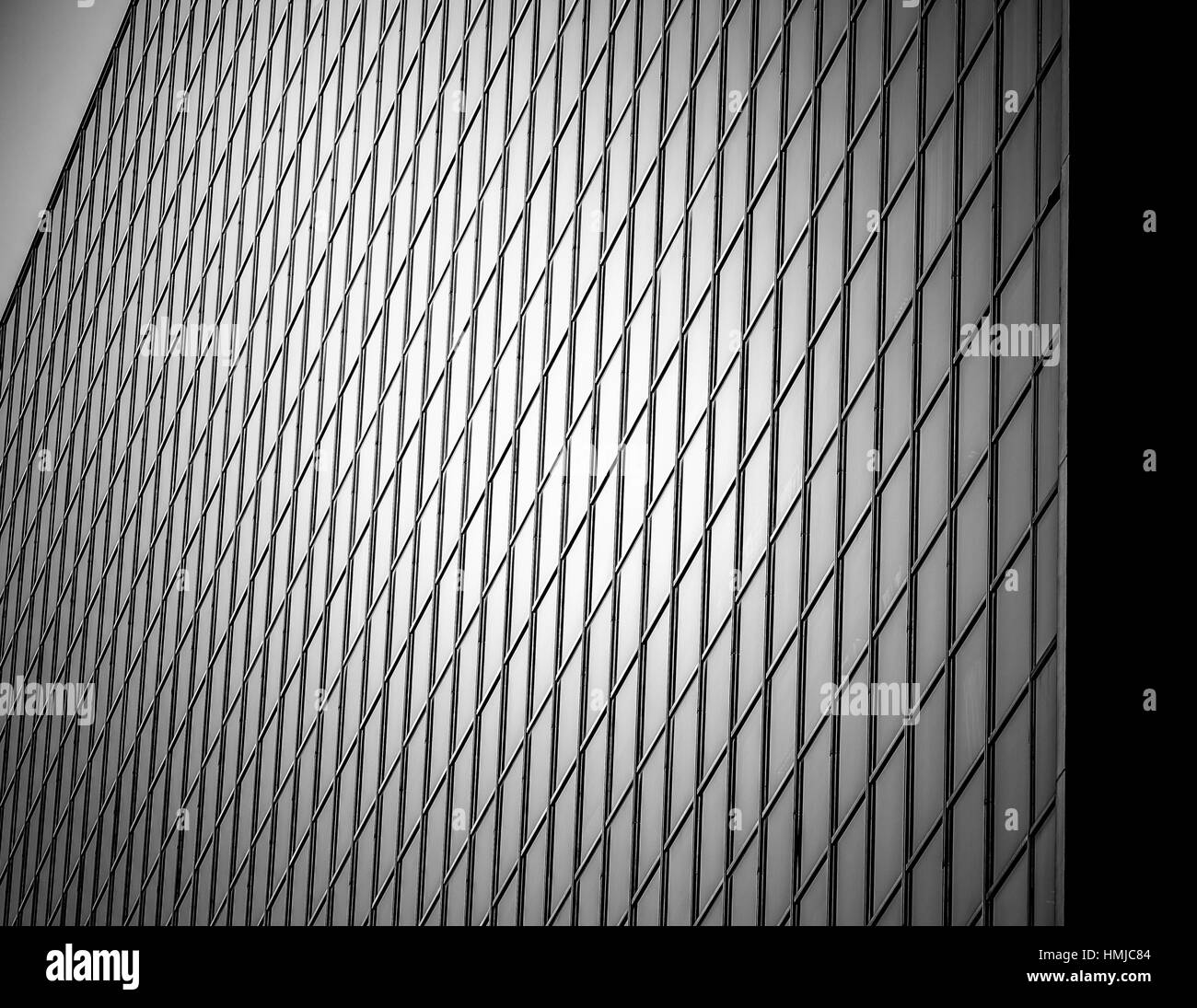 Windows of commercial building in Hong Kong with B&W color Stock Photo ...