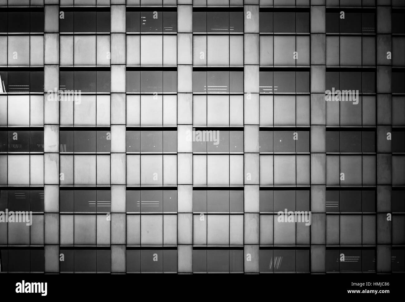 Windows of commercial building in Hong Kong with B&W color Stock Photo ...