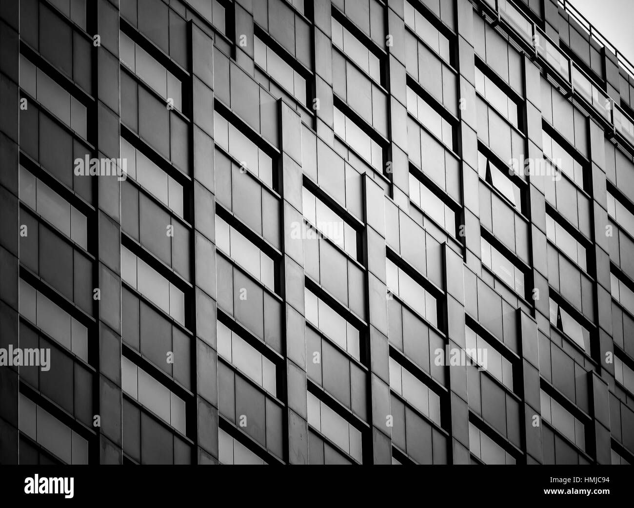 Windows of commercial building in Hong Kong with B&W color Stock Photo ...