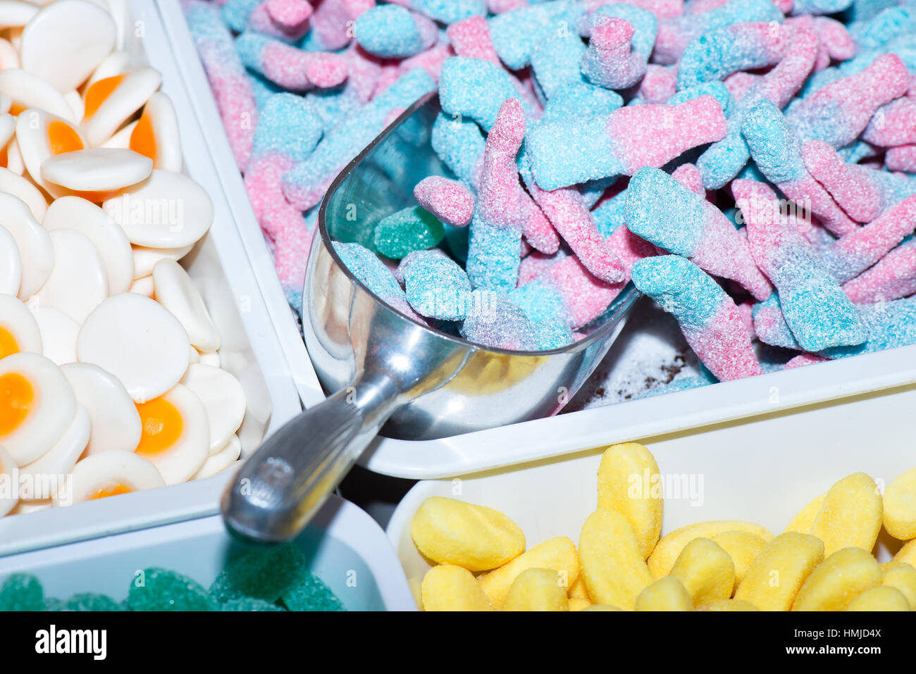 candy grips with scoop on street market Stock Photo - Alamy